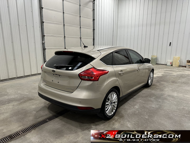 Salvage 2017 Ford Focus Titanium | X2 BUILDERS